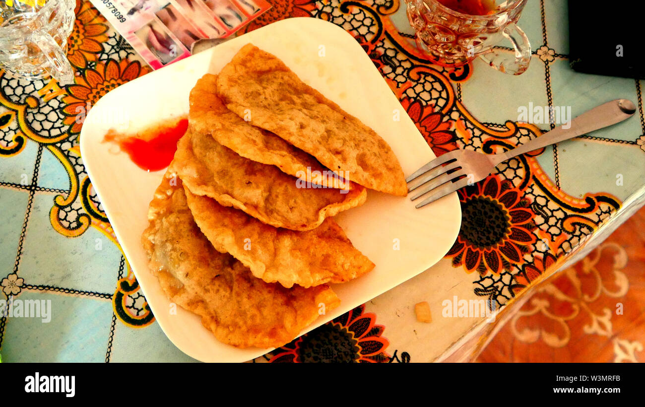 Khuushuur, a traditional Mongolian dish Stock Photo - Alamy
