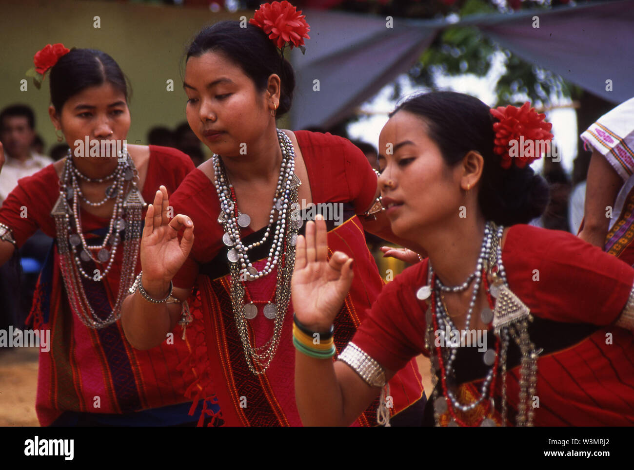 Tribal women are performing a tribal dance at a ceremony. Bangladesh ...