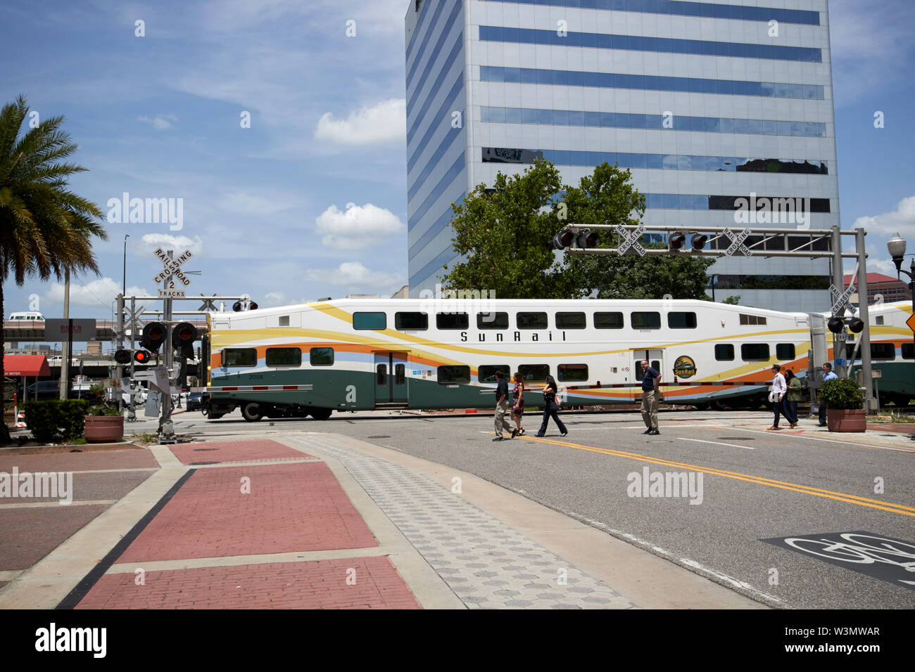 sunrail passenger train crossing level crossing in downtown Orlando ...