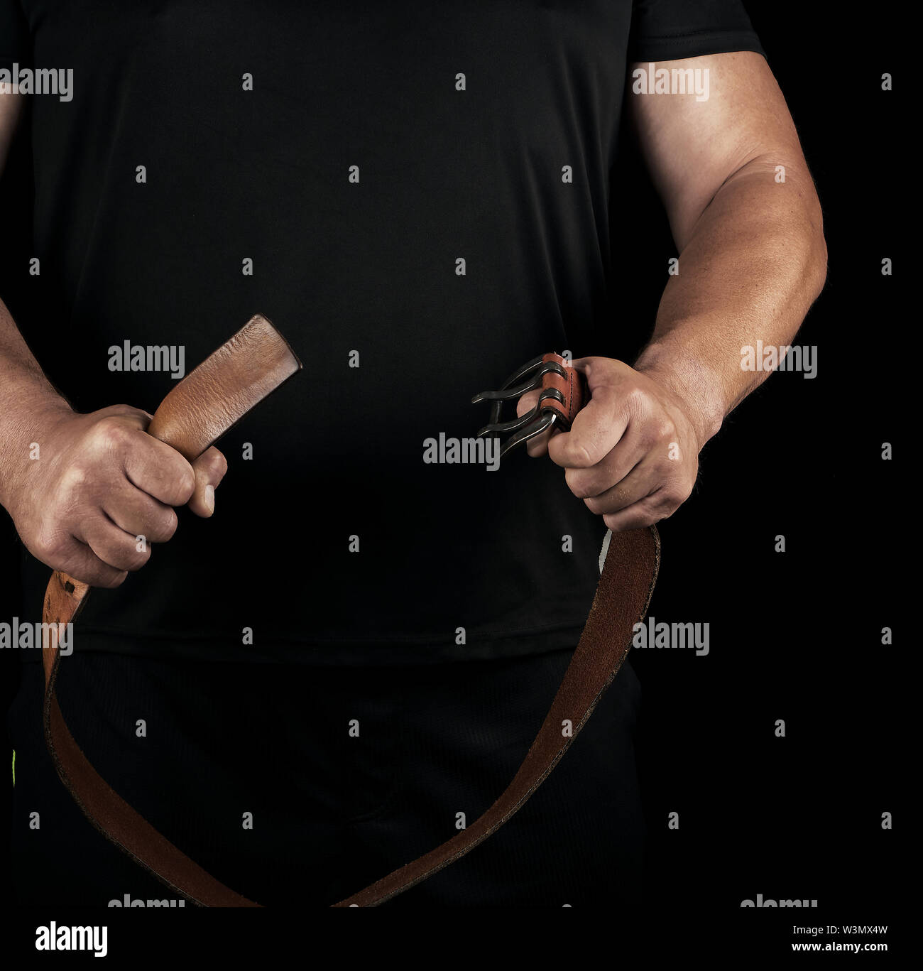 Holding whip man hi-res stock photography and images - Alamy