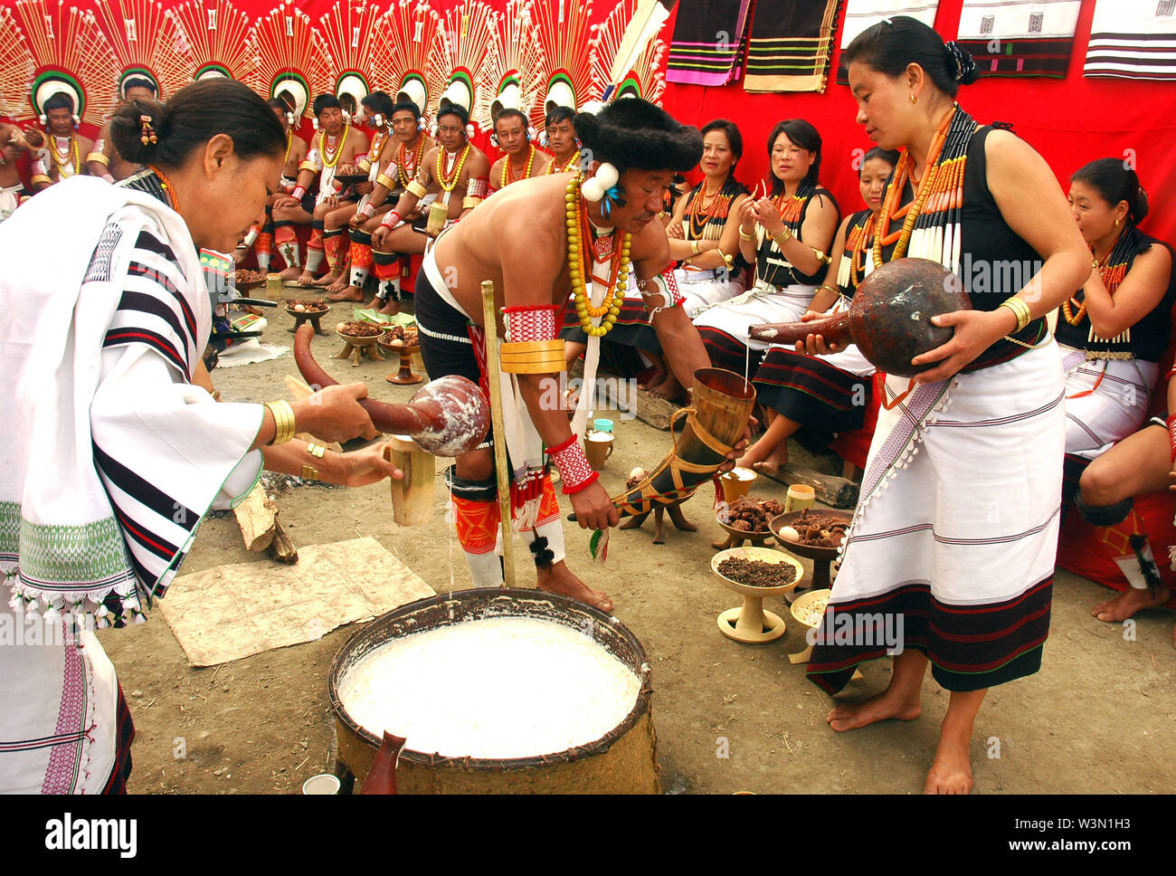 People from the ethnic Angami community having food on the annual ...