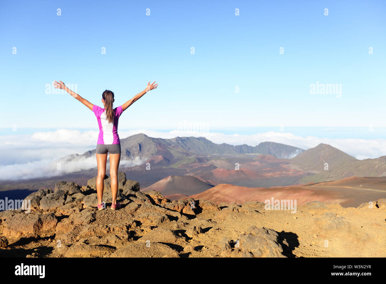 Hikers celebrating at mountain top hi-res stock photography and images ...