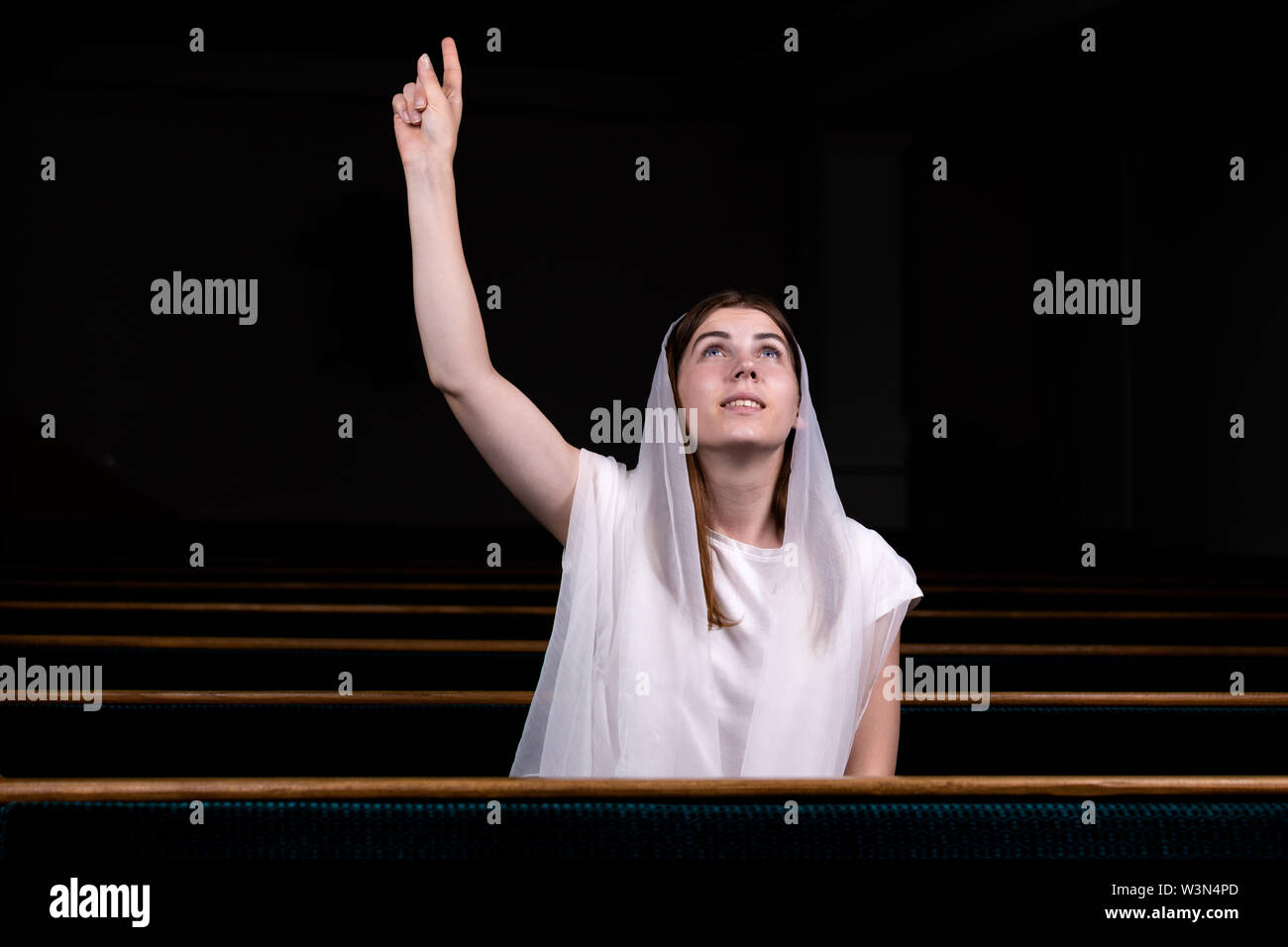Muslim woman sitting on prayer hi-res stock photography and images - Alamy