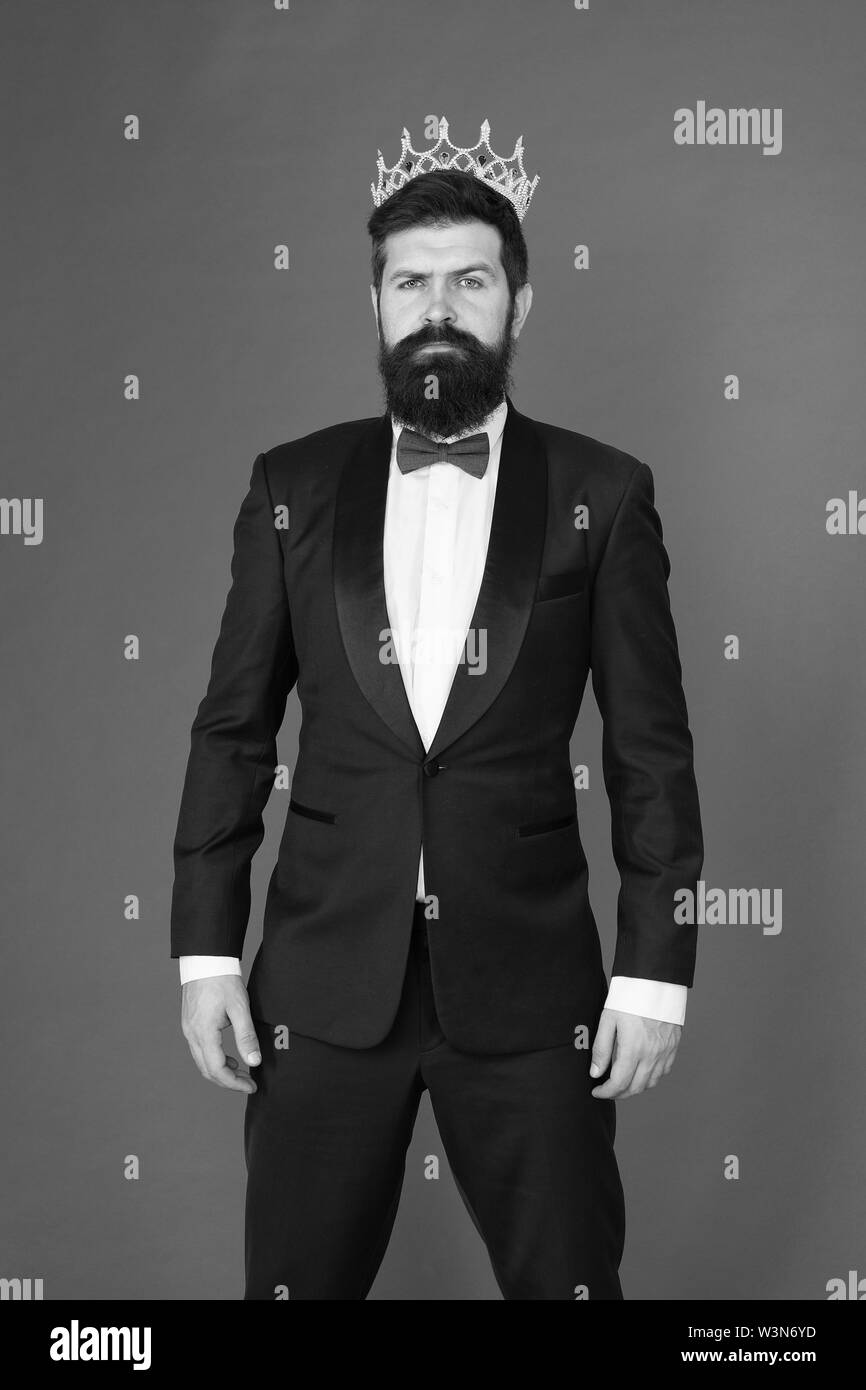 Feeling superior. Man bearded guy in tuxedo golden crown symbol of ...