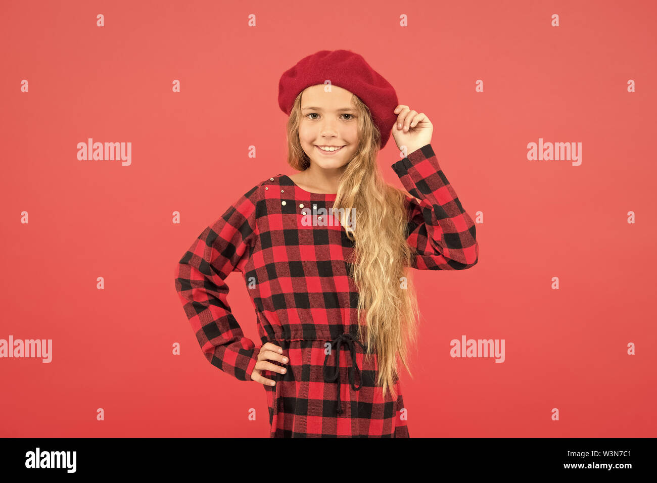 Kid little cute girl with long blonde hair posing in beret hat and ...