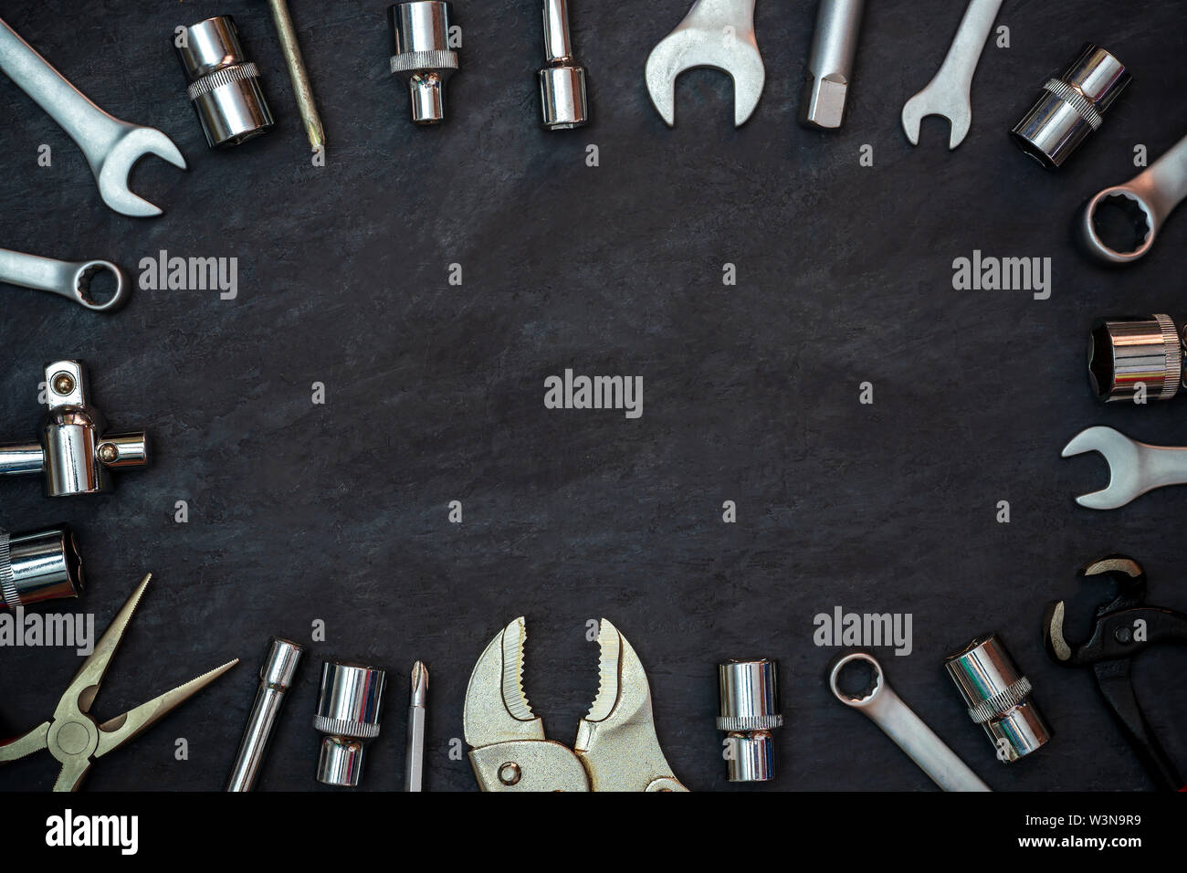 Craftsman tool on black cement background. Copy space for your text ...