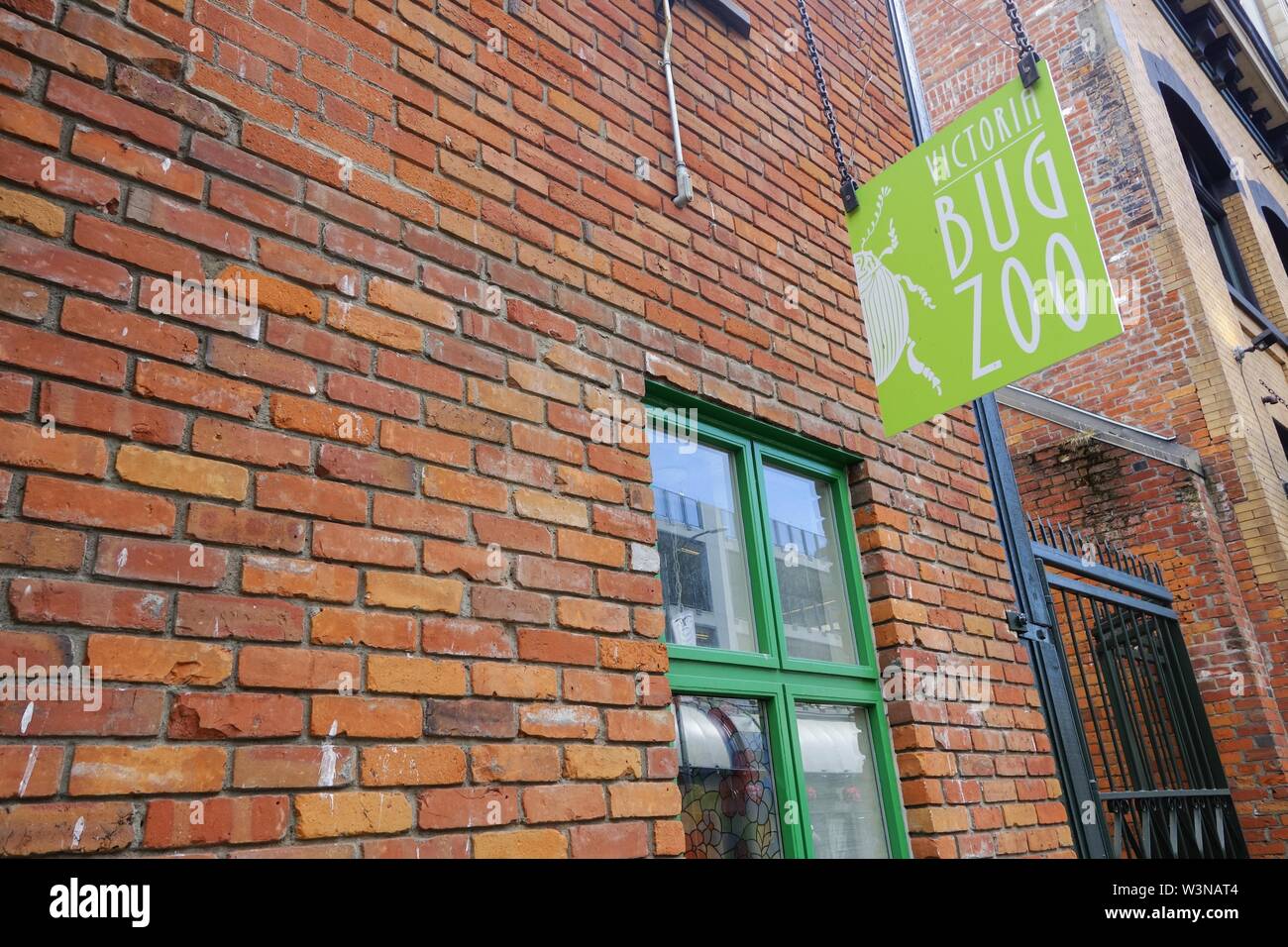 Entrance Table to Victoria Bug Zoo against the Red Brick Wall with ...