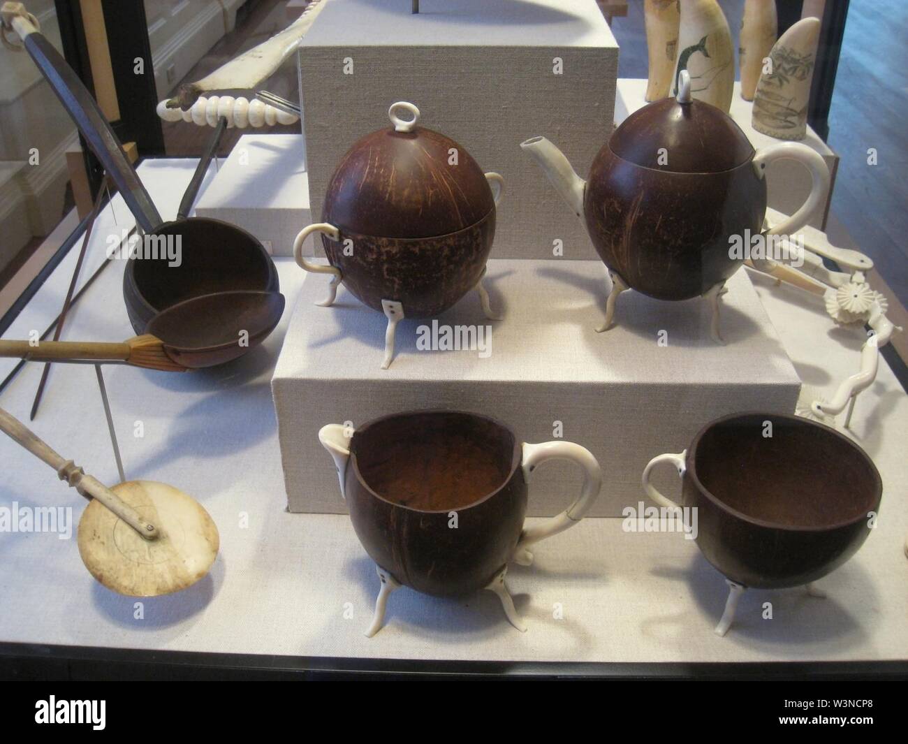 Coconut shell dipper and tea set Stock Photo - Alamy