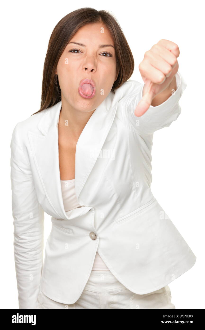 Portrait of businesswoman sticking out tongue while gesturing thumbs ...