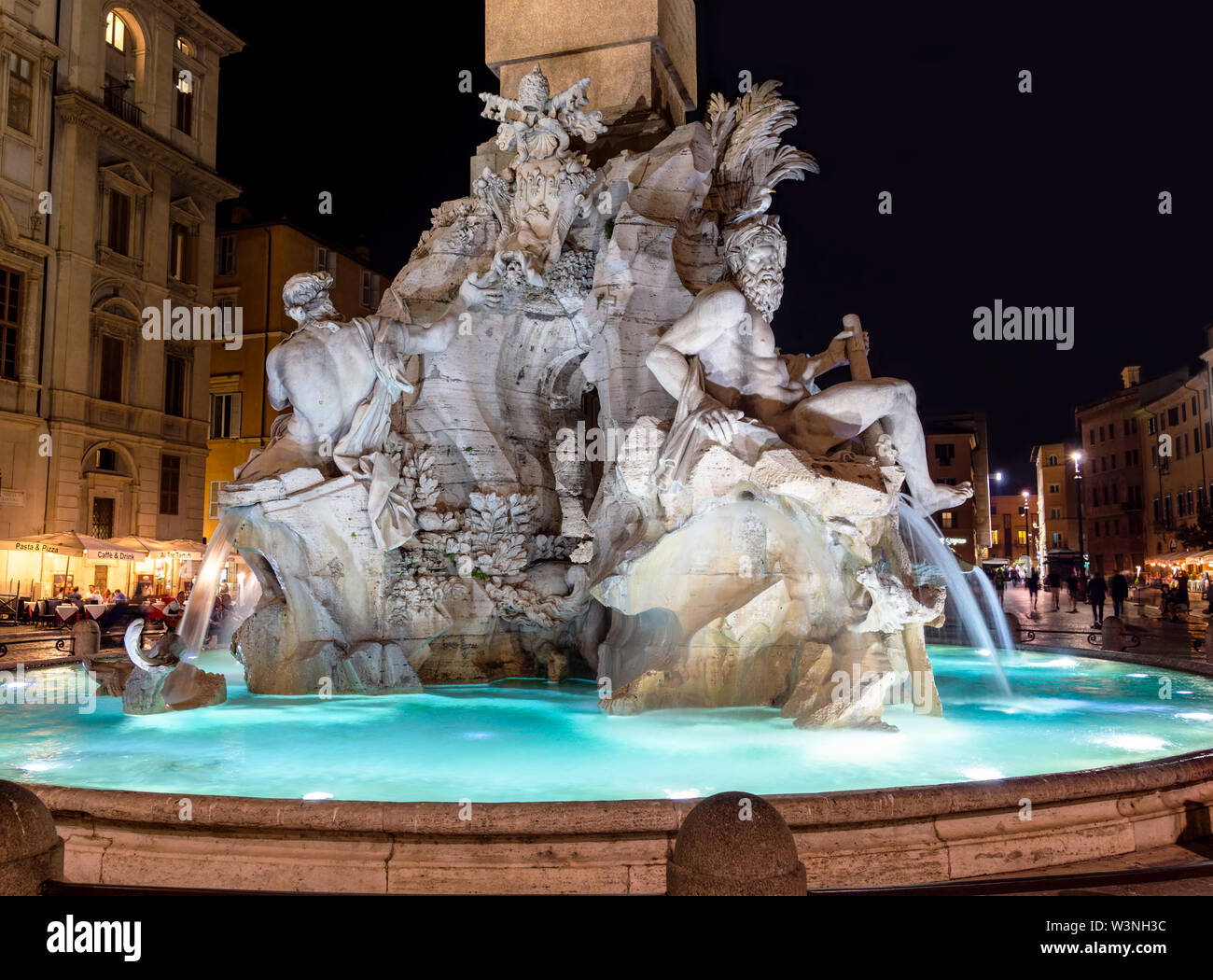 Four Rivers Fountain at night on Piazza Navona - Rome, Italy Stock ...