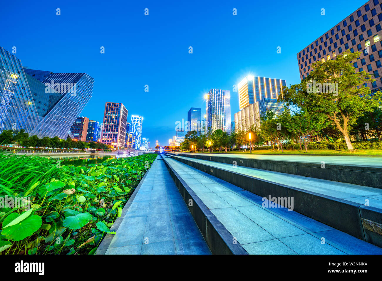 Modern city skyline, Ninbo, China at night Stock Photo - Alamy