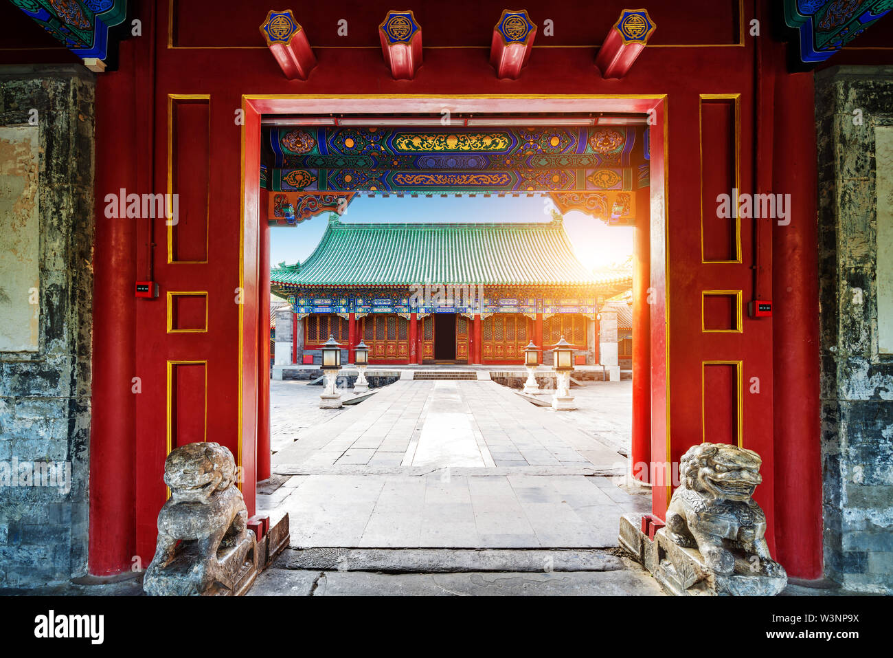 Red gates and historic buildings, Beijing, China Stock Photo - Alamy