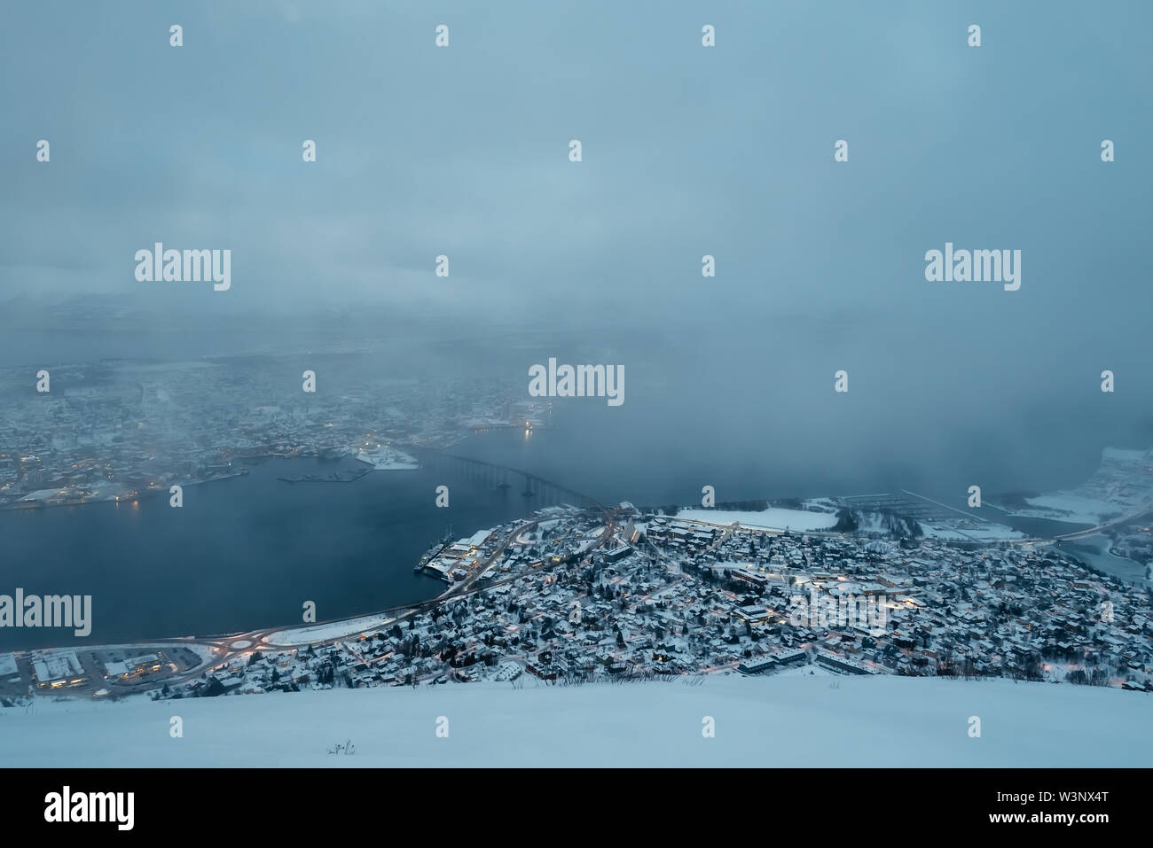 Aerial view to the city of Tromso in winter from above, Northern Norway ...