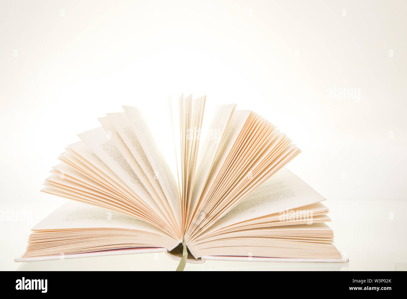 book open on white background Stock Photo - Alamy