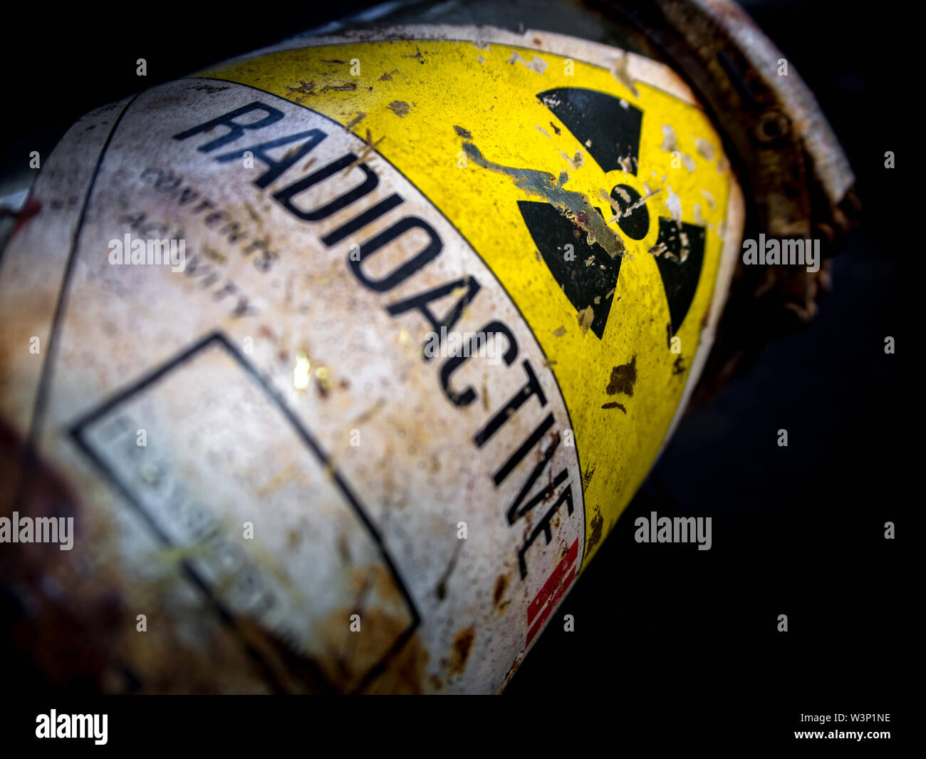 Radiation warning sign on transport index label stick on the rust and ...