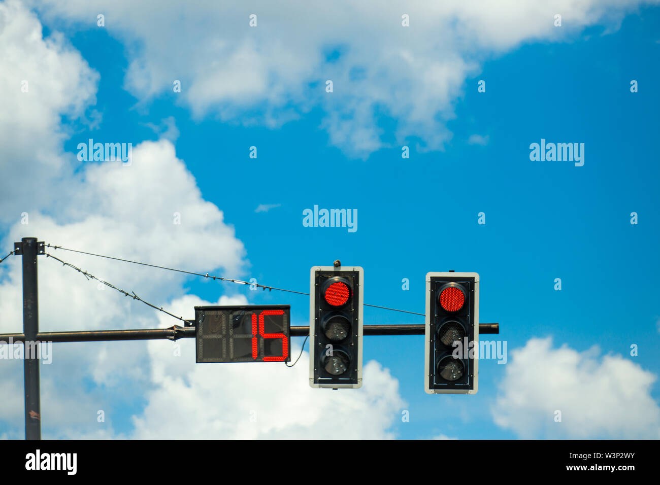 red color on the traffic light with a beautiful blue sky,red color on ...