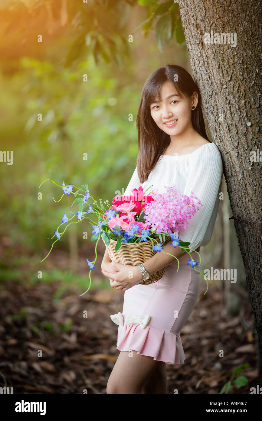 Smiling asian sunshine girl hi-res stock photography and images - Alamy