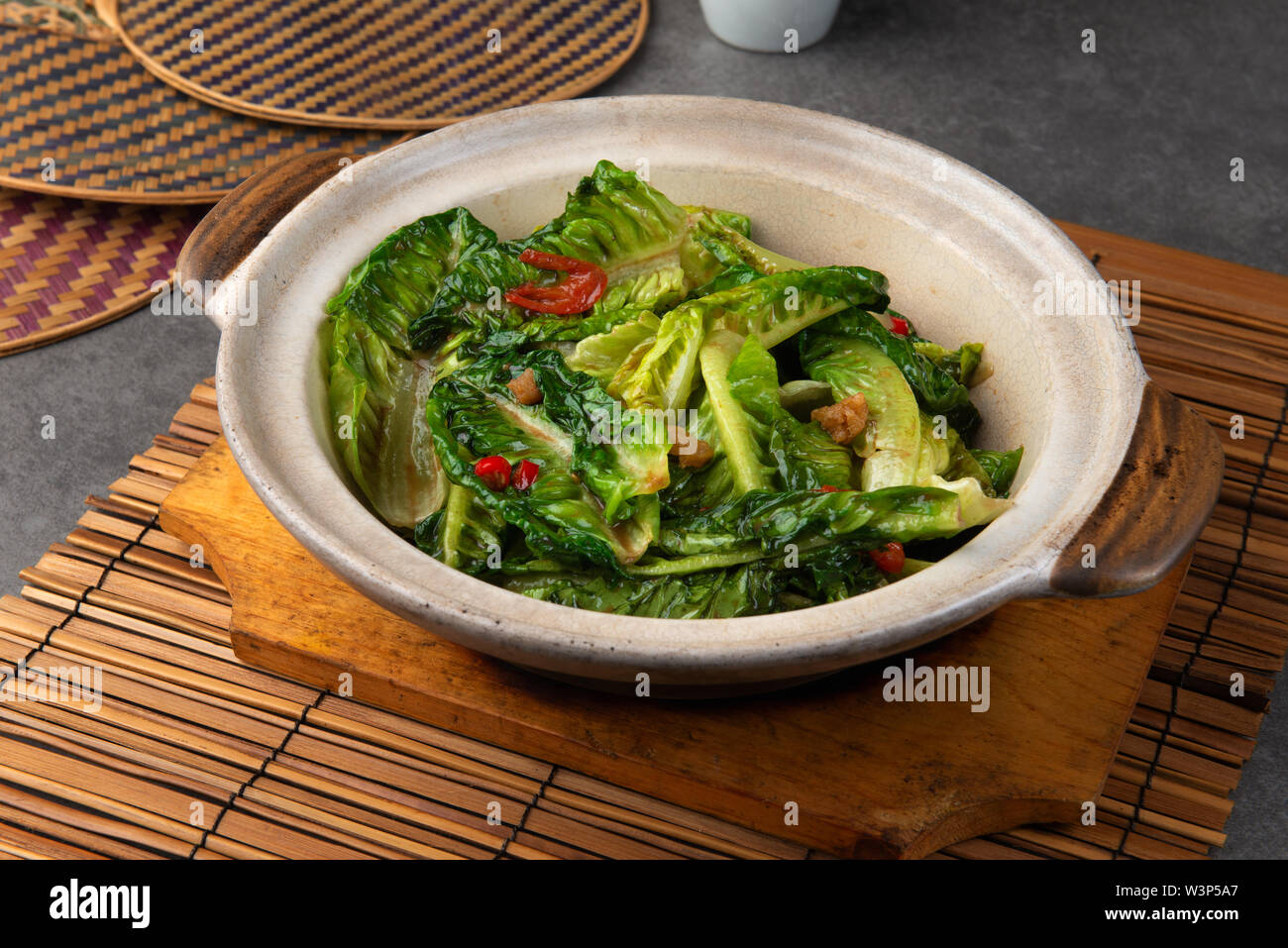 chinese fry lettuce with background Stock Photo - Alamy