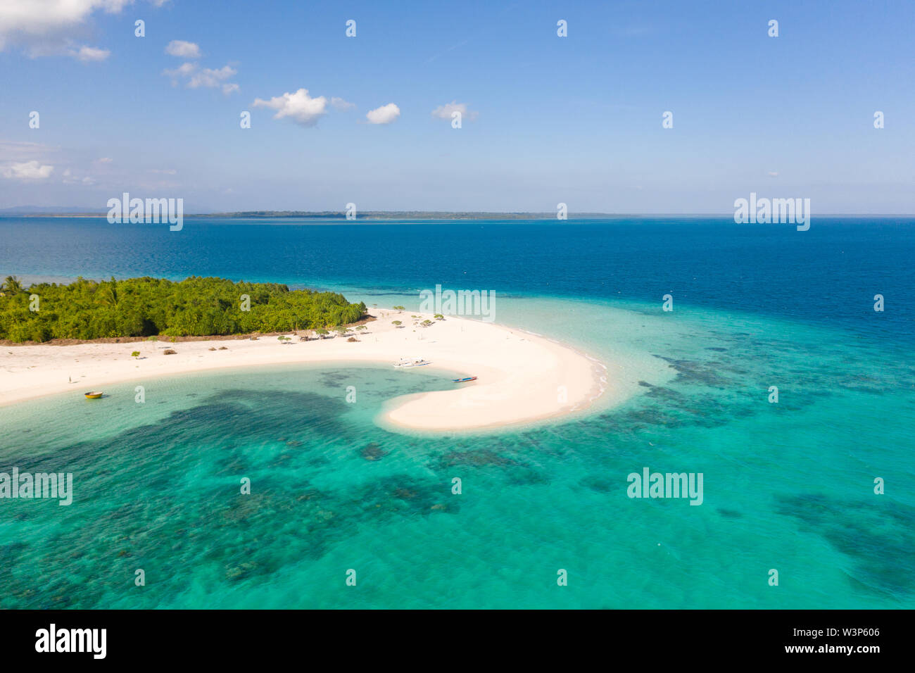 Patawan island. Small tropical island with white sandy beach. Beautiful ...