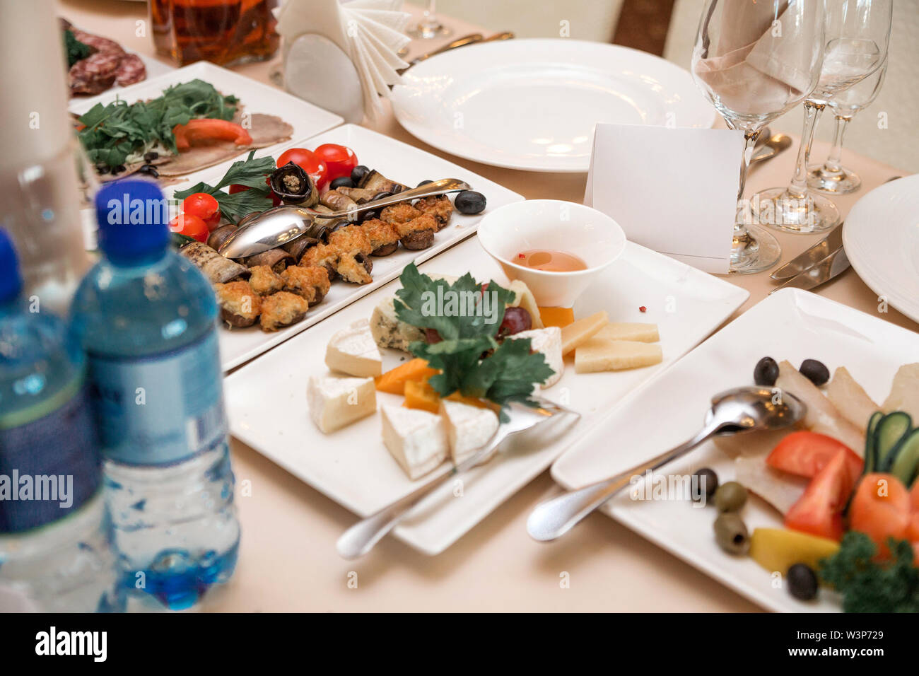 a variety of snacks on the banquet table Stock Photo - Alamy