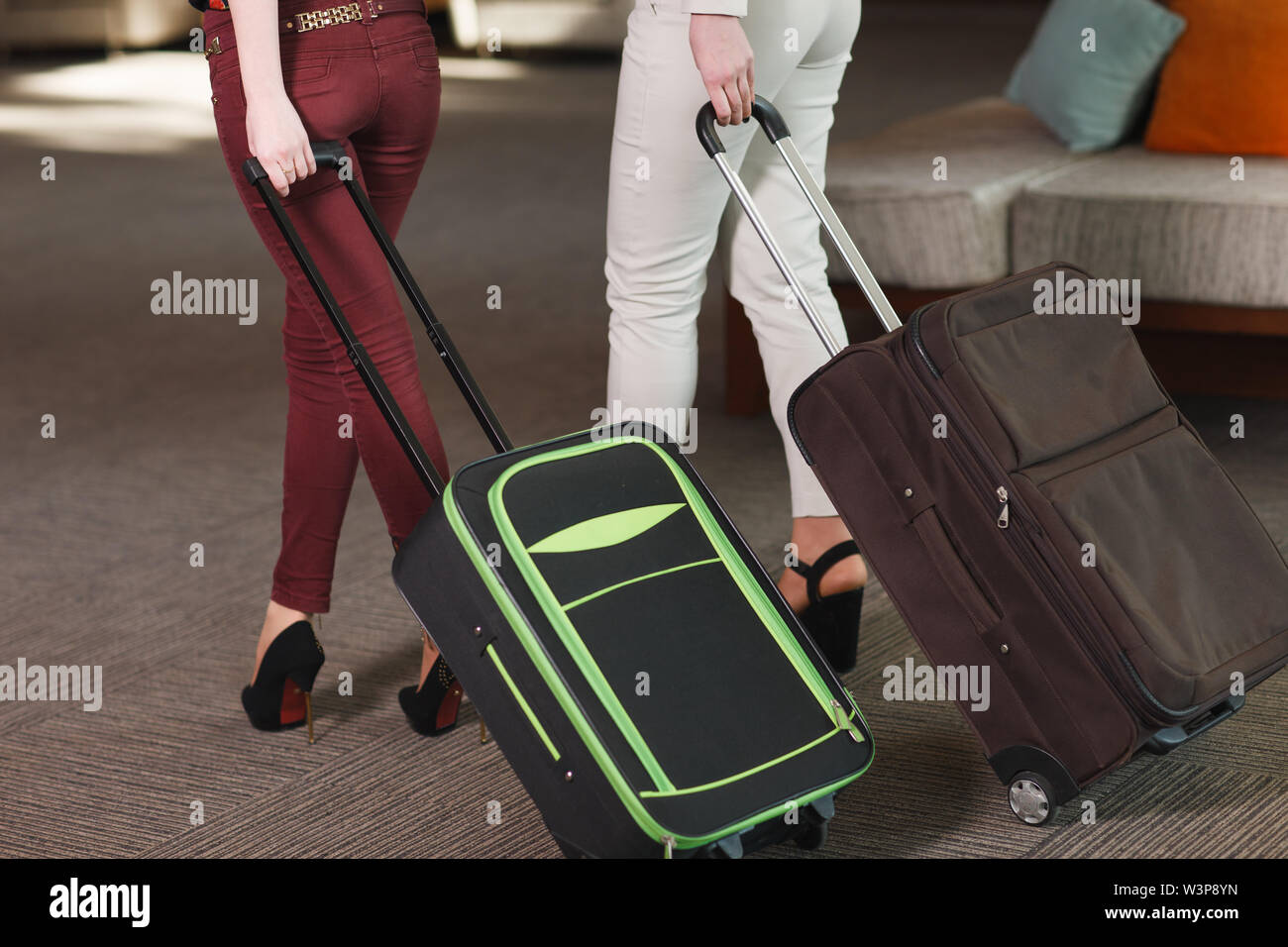 Woman legs walking suitcase hi-res stock photography and images - Alamy