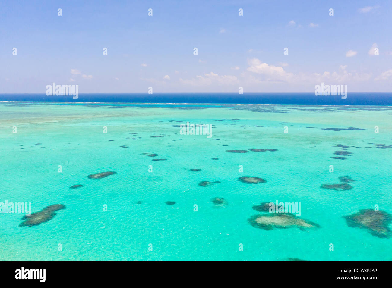 Sea water with lagoon and reefs, water background. Seascape with clear ...