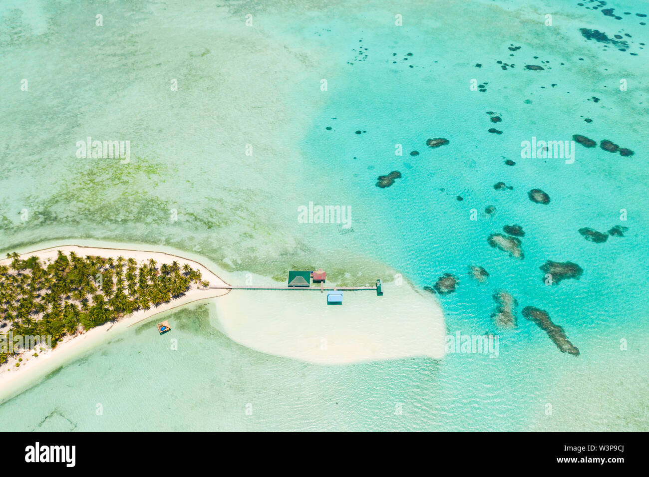 Tropical island surrounded by beautiful lagoons. Onok Island Balabac ...