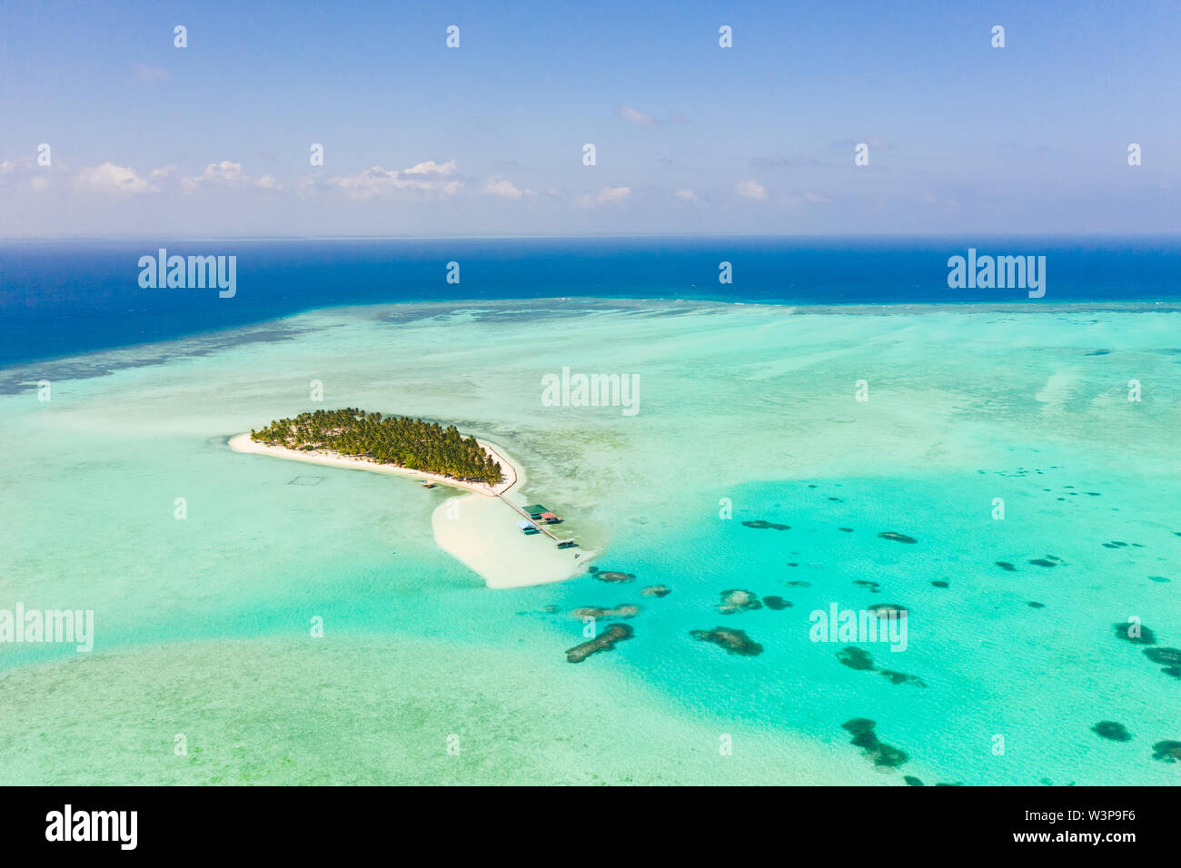 Tropical island surrounded by beautiful lagoons. Onok Island Balabac ...
