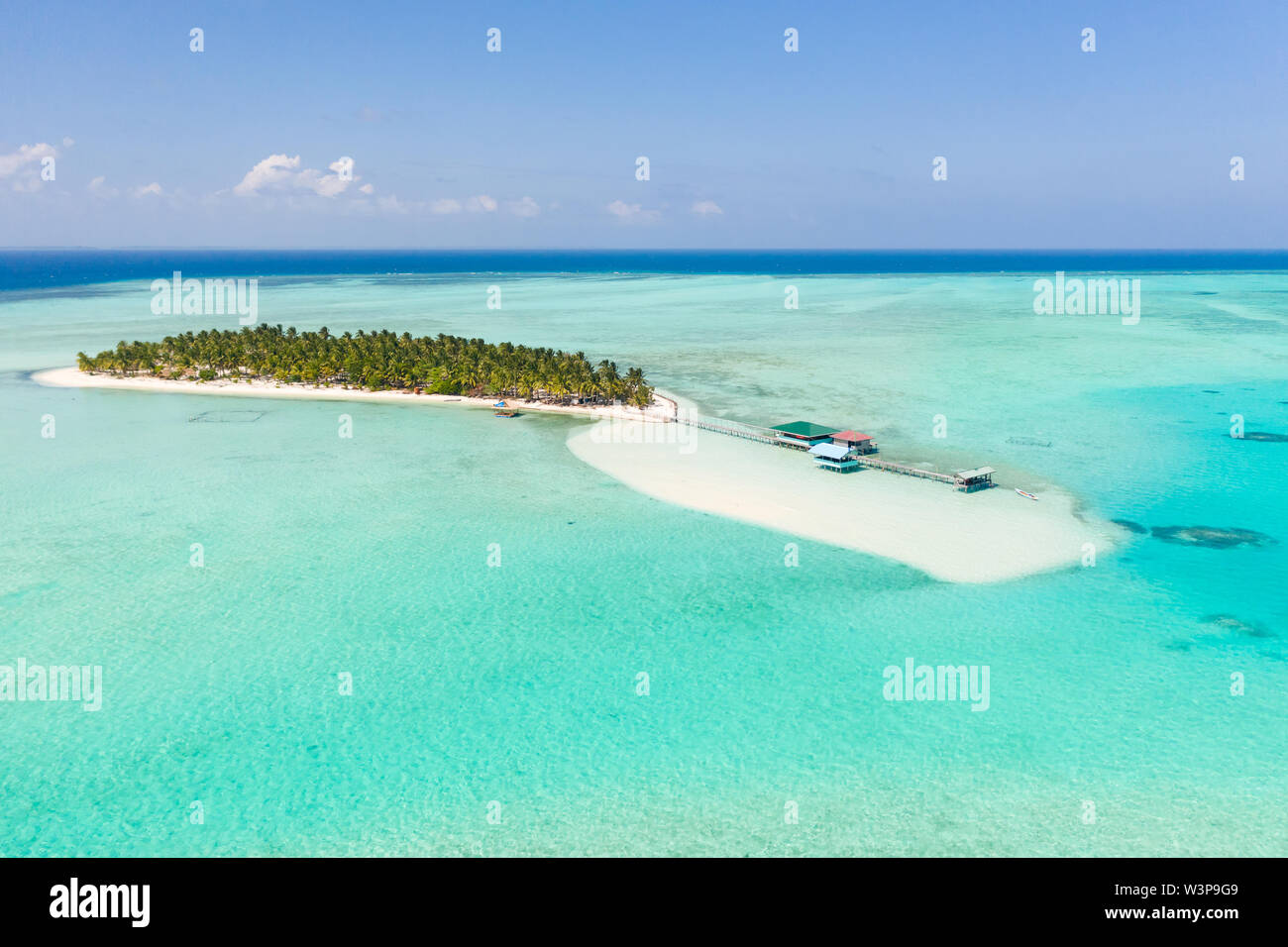 Tropical island surrounded by beautiful lagoons. Onok Island Balabac ...