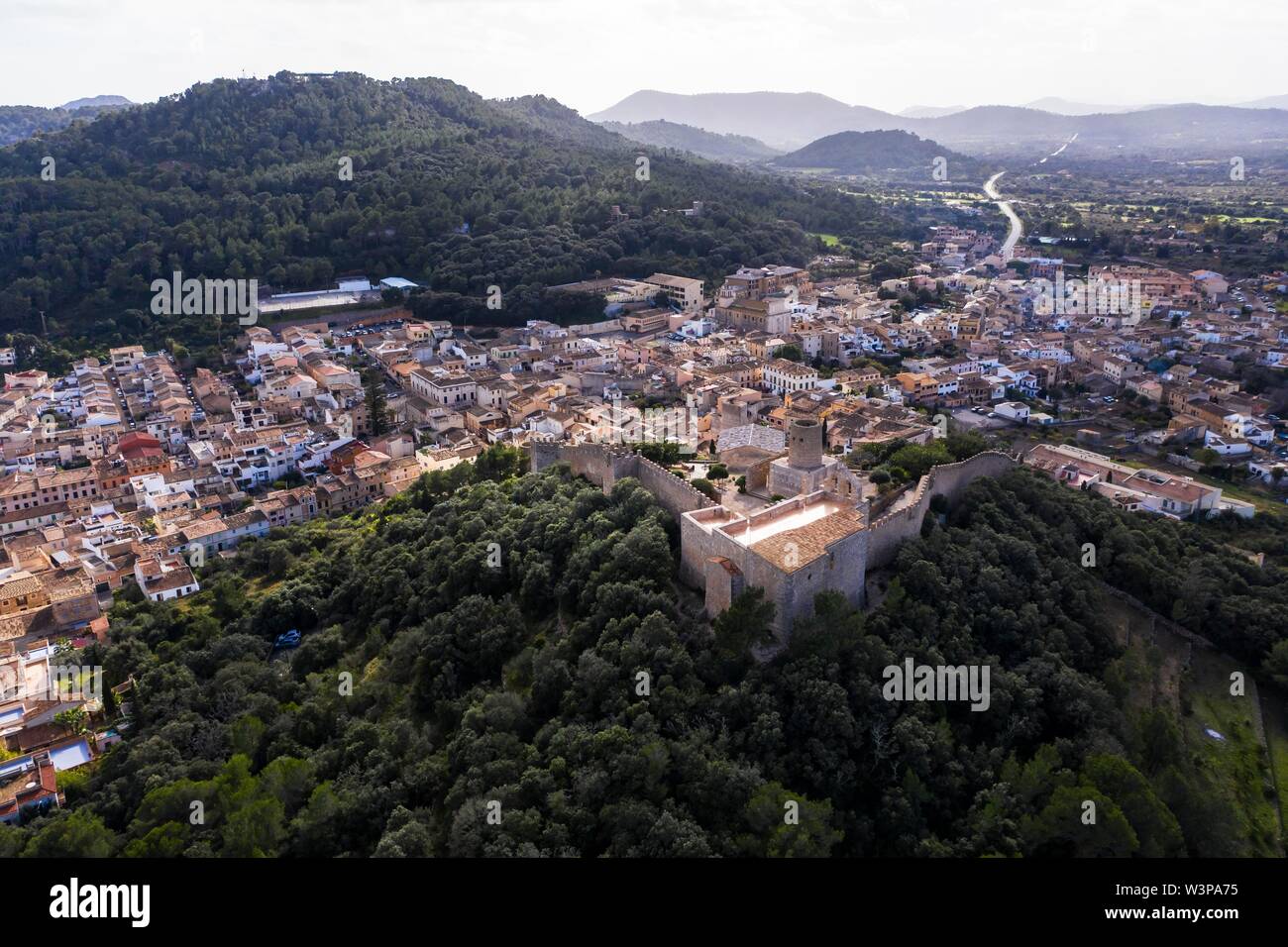 Drone shot, city view with Castell de Capdepera, Capdepera, Majorca ...