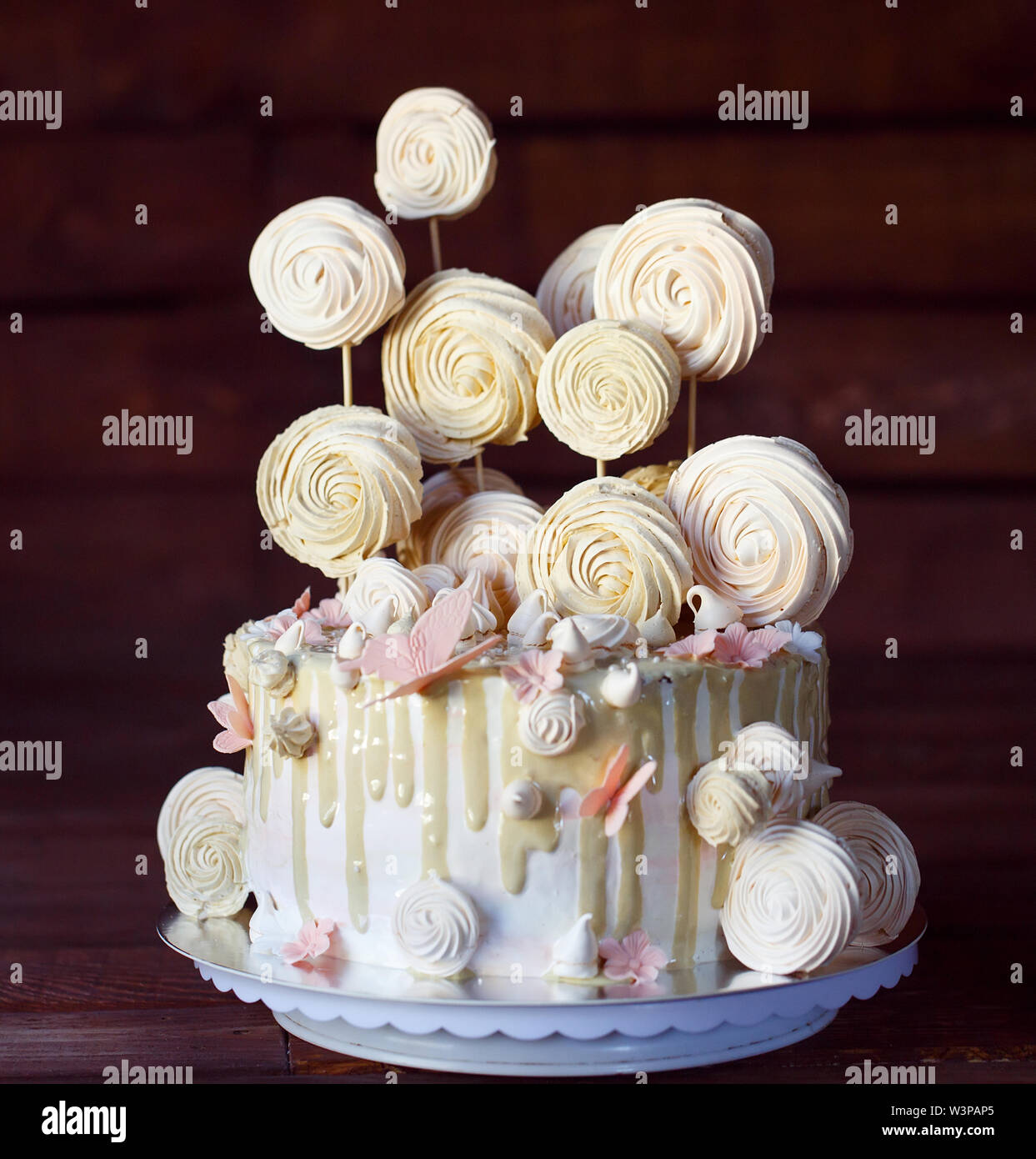Cake with meringue as sweet treat and dessert Stock Photo - Alamy