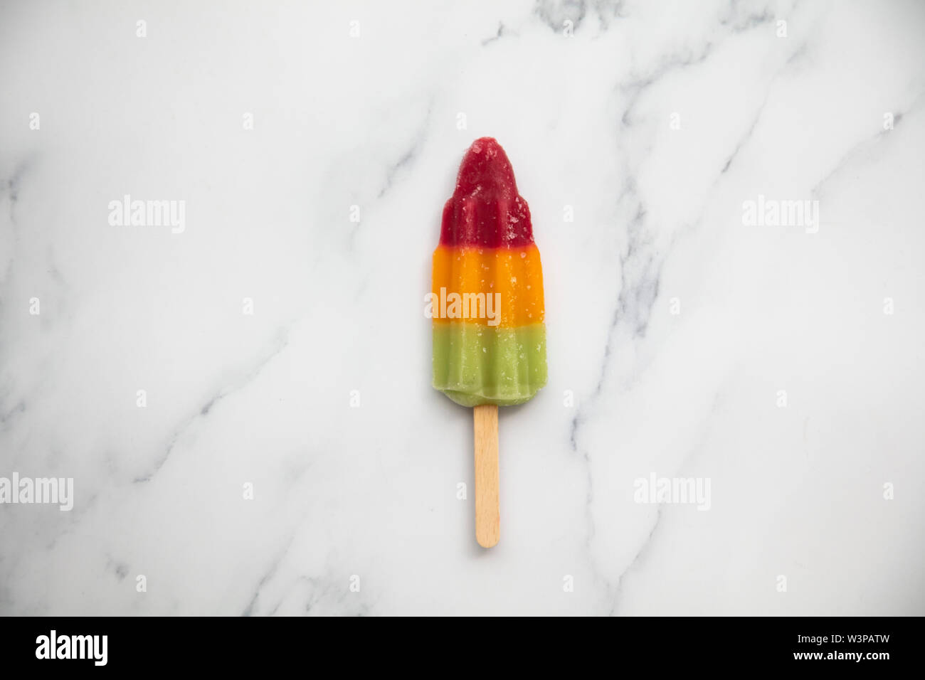 Summer fruit ice lolly popcicle on a marble background Stock Photo - Alamy