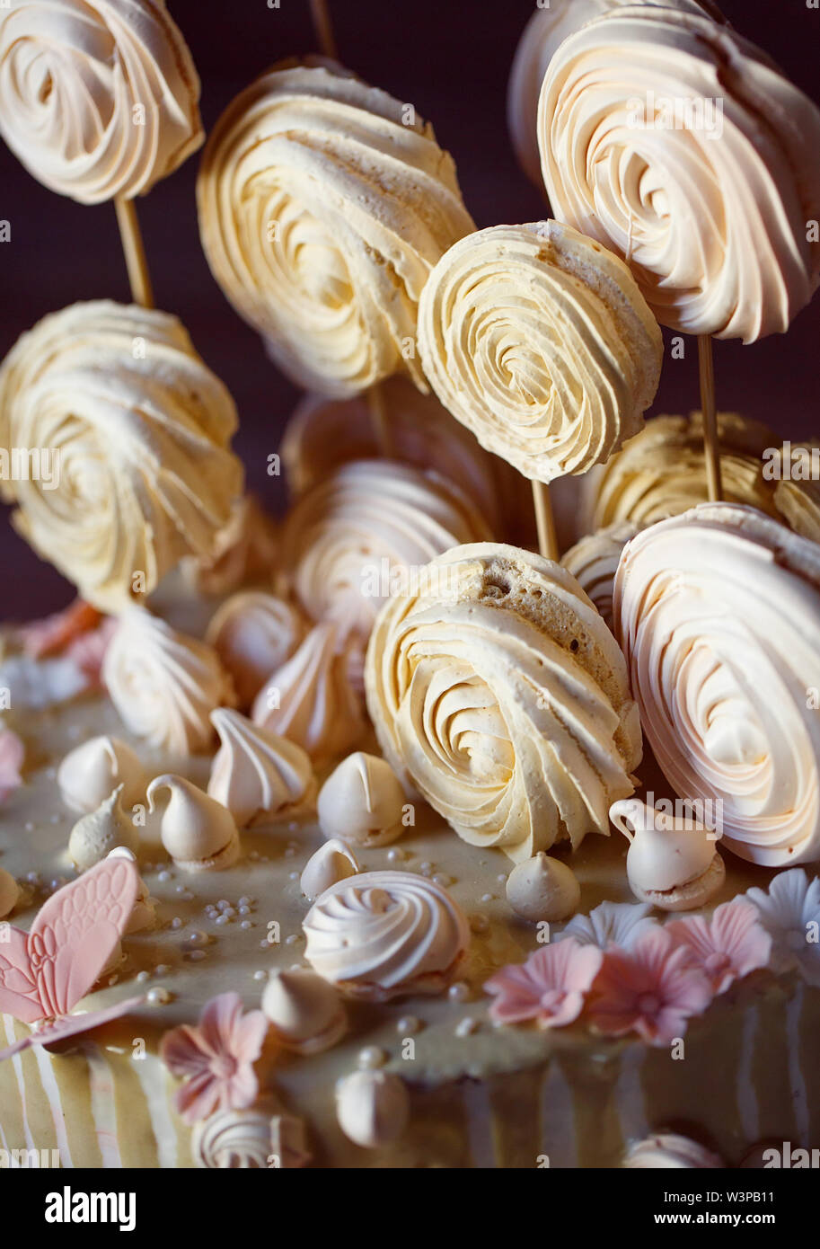 Cake with meringue as sweet treat and dessert Stock Photo - Alamy