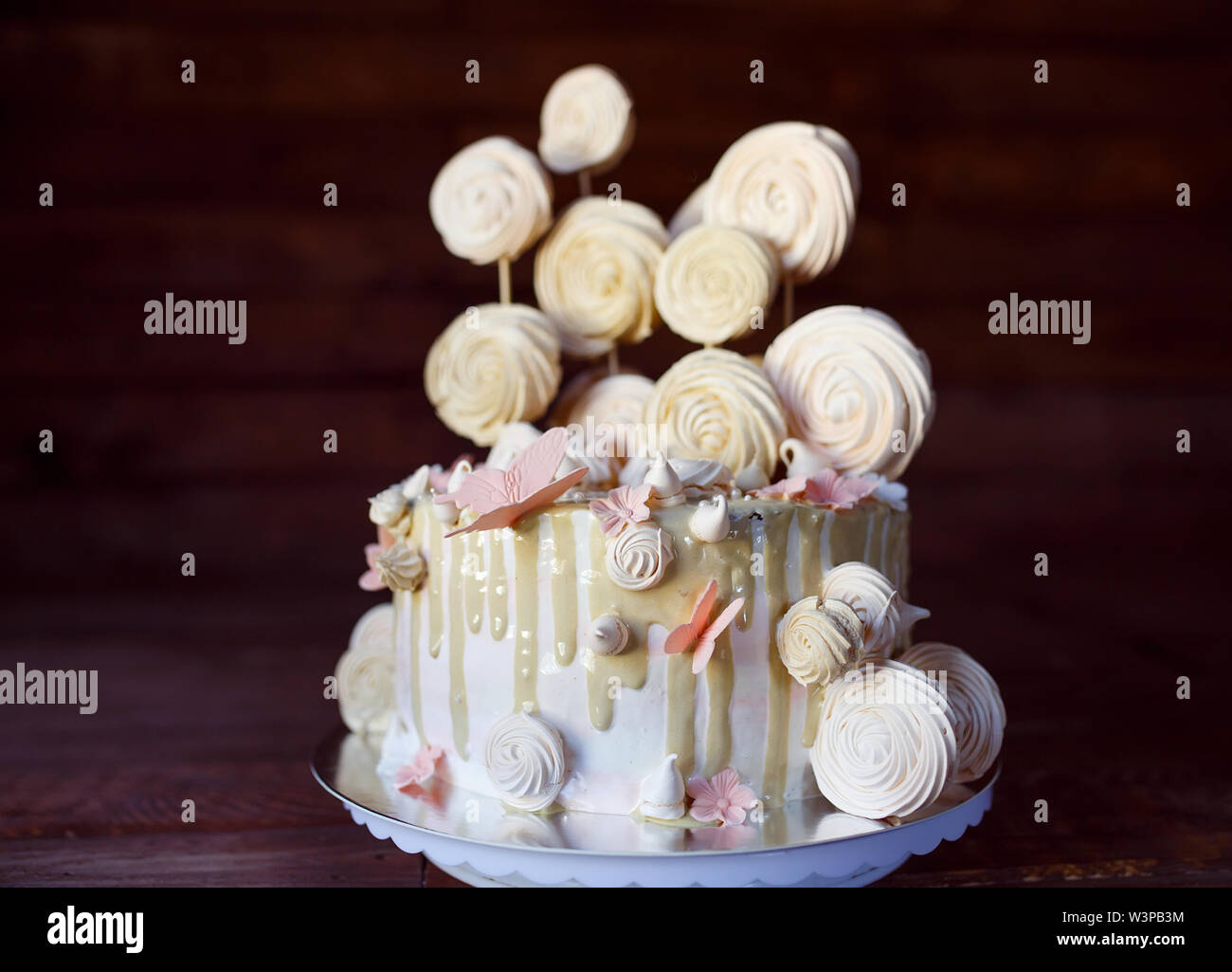 Cake with meringue as sweet treat and dessert Stock Photo - Alamy