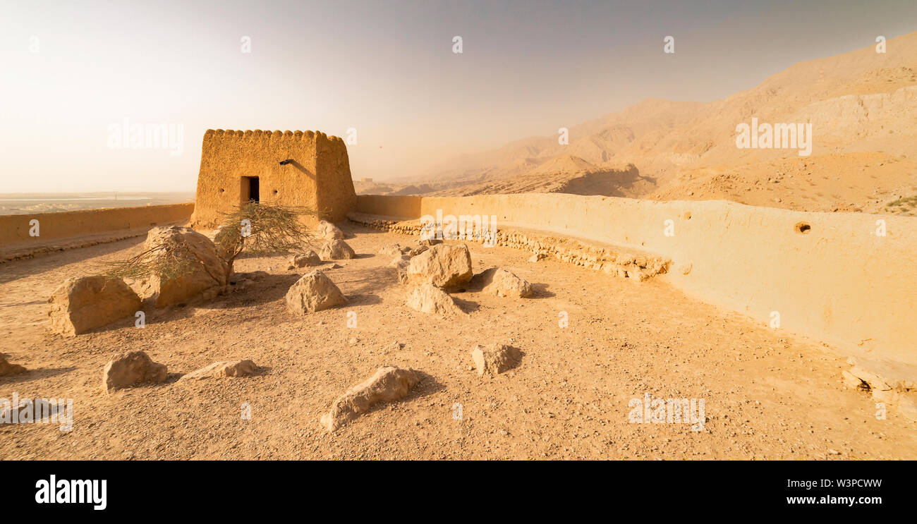 Mountain landscape in the desert with a fortress. Dhayah Fort. Ras Al ...