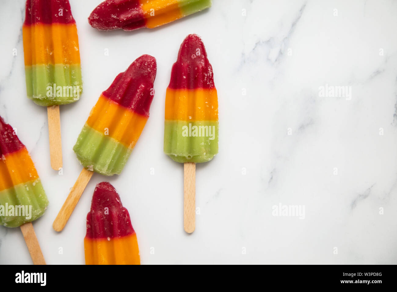 Summer fruit ice lolly popcicle on a marble background Stock Photo - Alamy