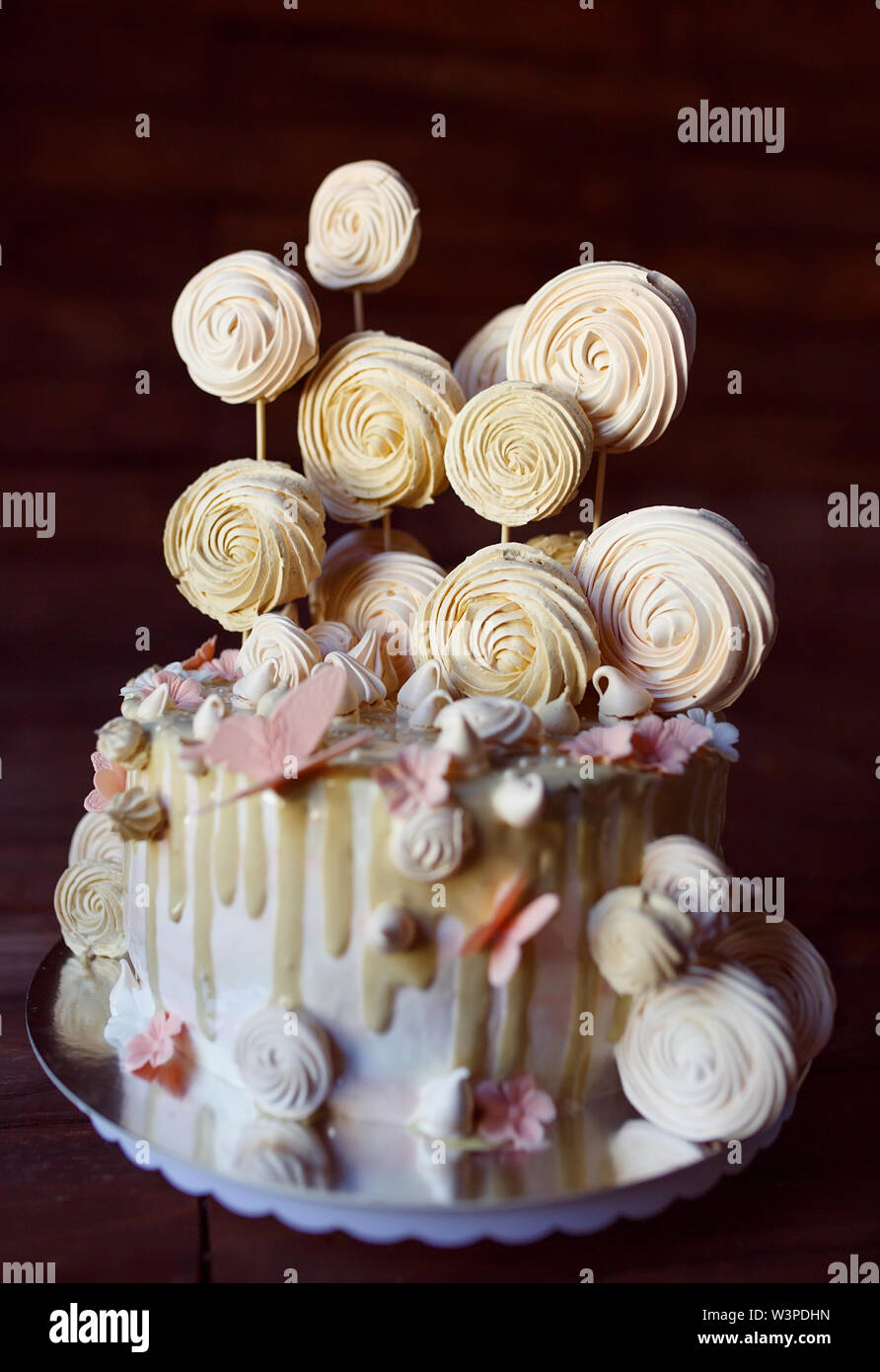 Cake with meringue as sweet treat and dessert Stock Photo - Alamy