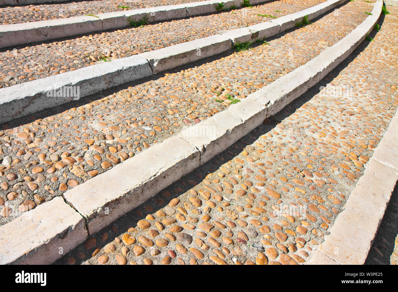 Paving and staircase made with white marble and stone pebbles Stock ...