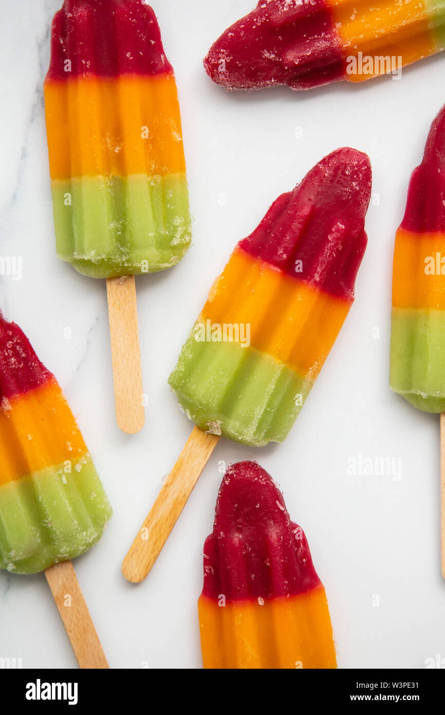 Summer fruit ice lolly popcicle on a marble background Stock Photo - Alamy
