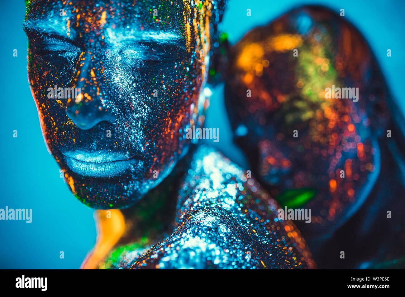 People colored fluorescent powder hi-res stock photography and images ...