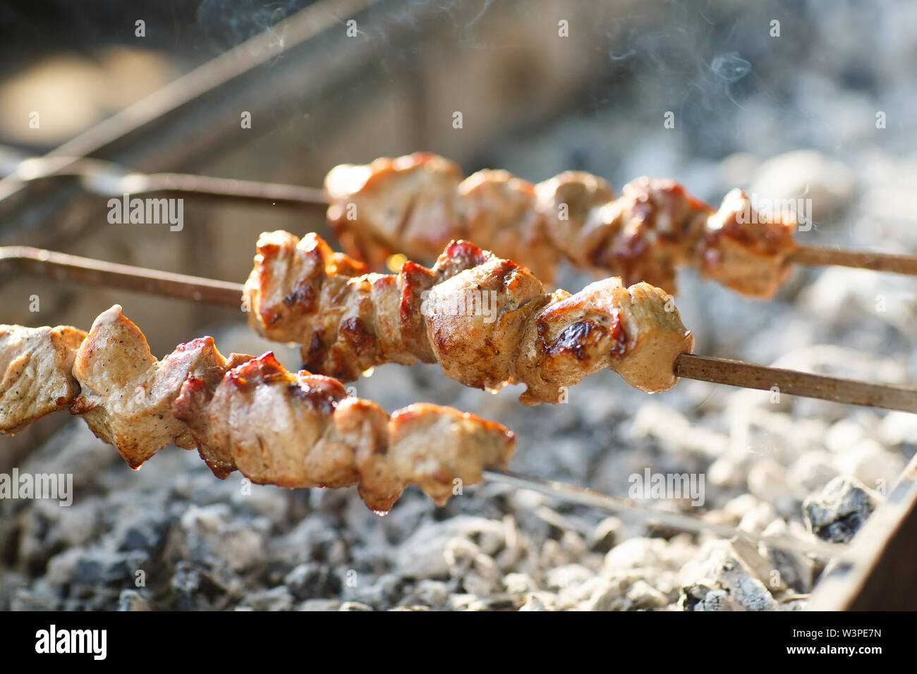 Cooking meat on the fire. Grilled charcoal Stock Photo - Alamy