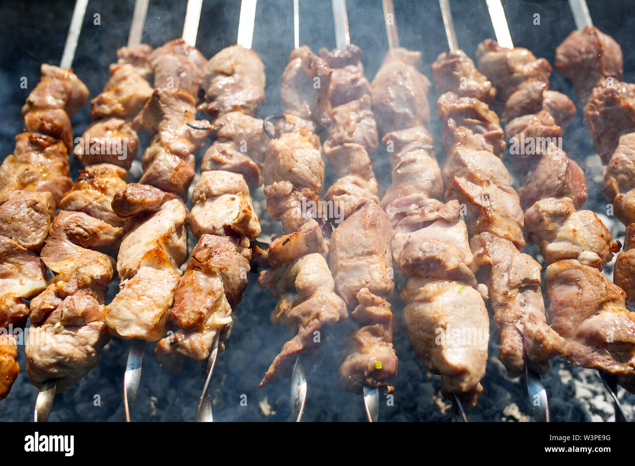 Cooking meat on the fire. Grilled charcoal Stock Photo - Alamy