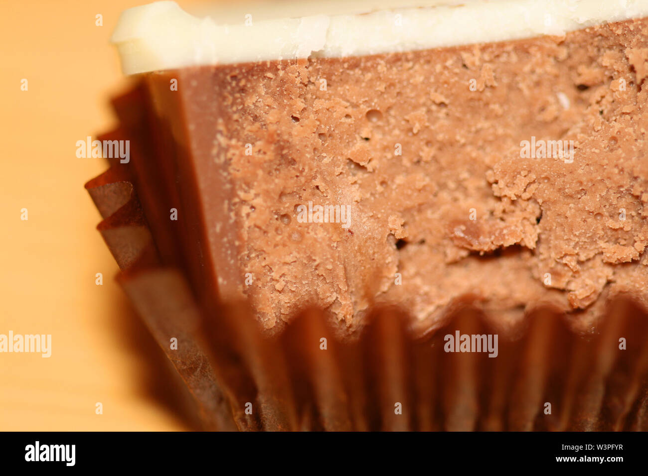 Closeup of swiss chocolate praline - cross-section Stock Photo - Alamy