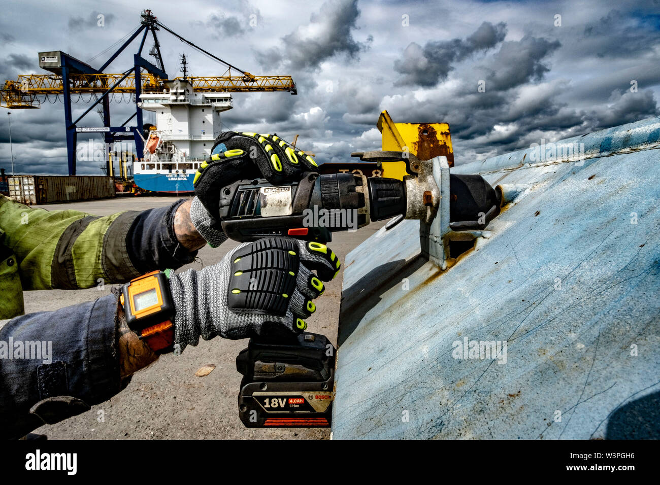 Skilled workers using power tools Stock Photo - Alamy