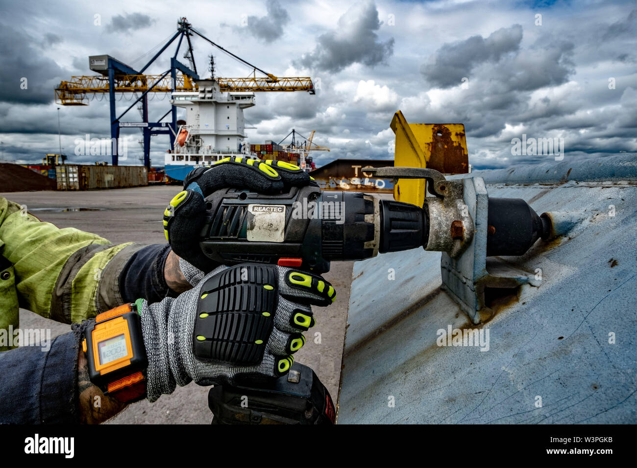 Skilled workers using power tools Stock Photo - Alamy