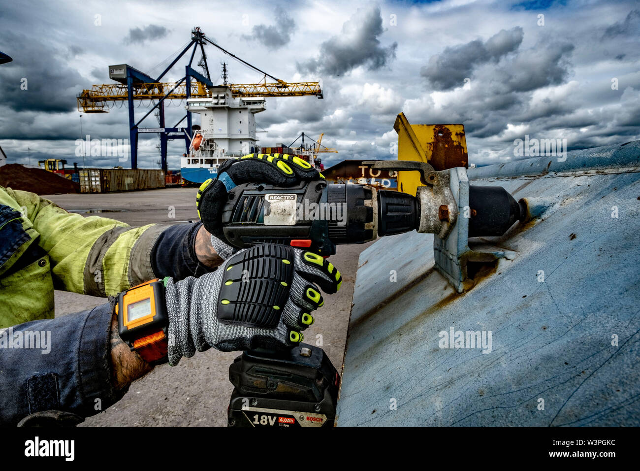 Skilled workers using power tools Stock Photo - Alamy