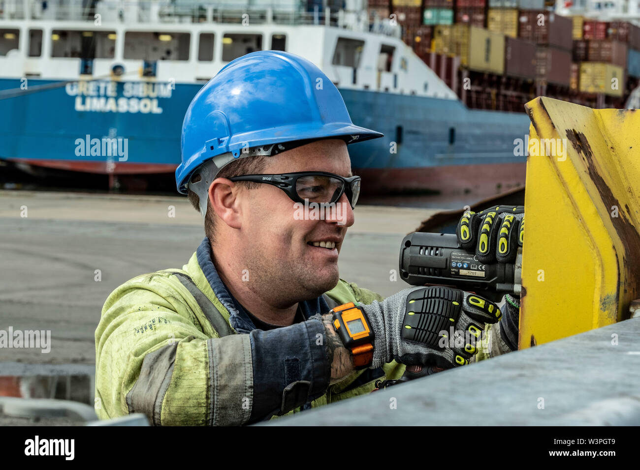 Skilled workers using power tools Stock Photo - Alamy