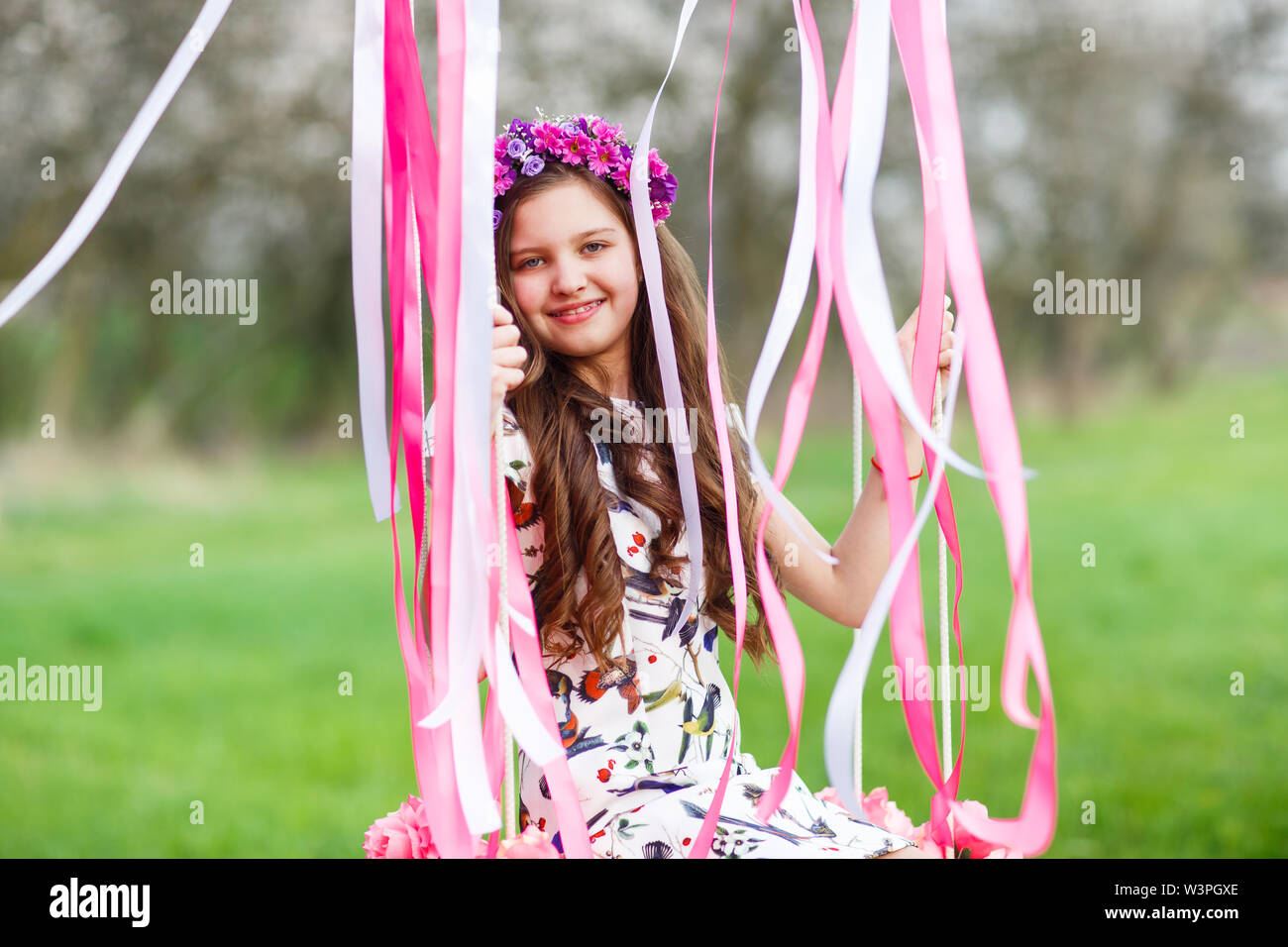 little cute girl on the swing, little girl at park Stock Photo - Alamy