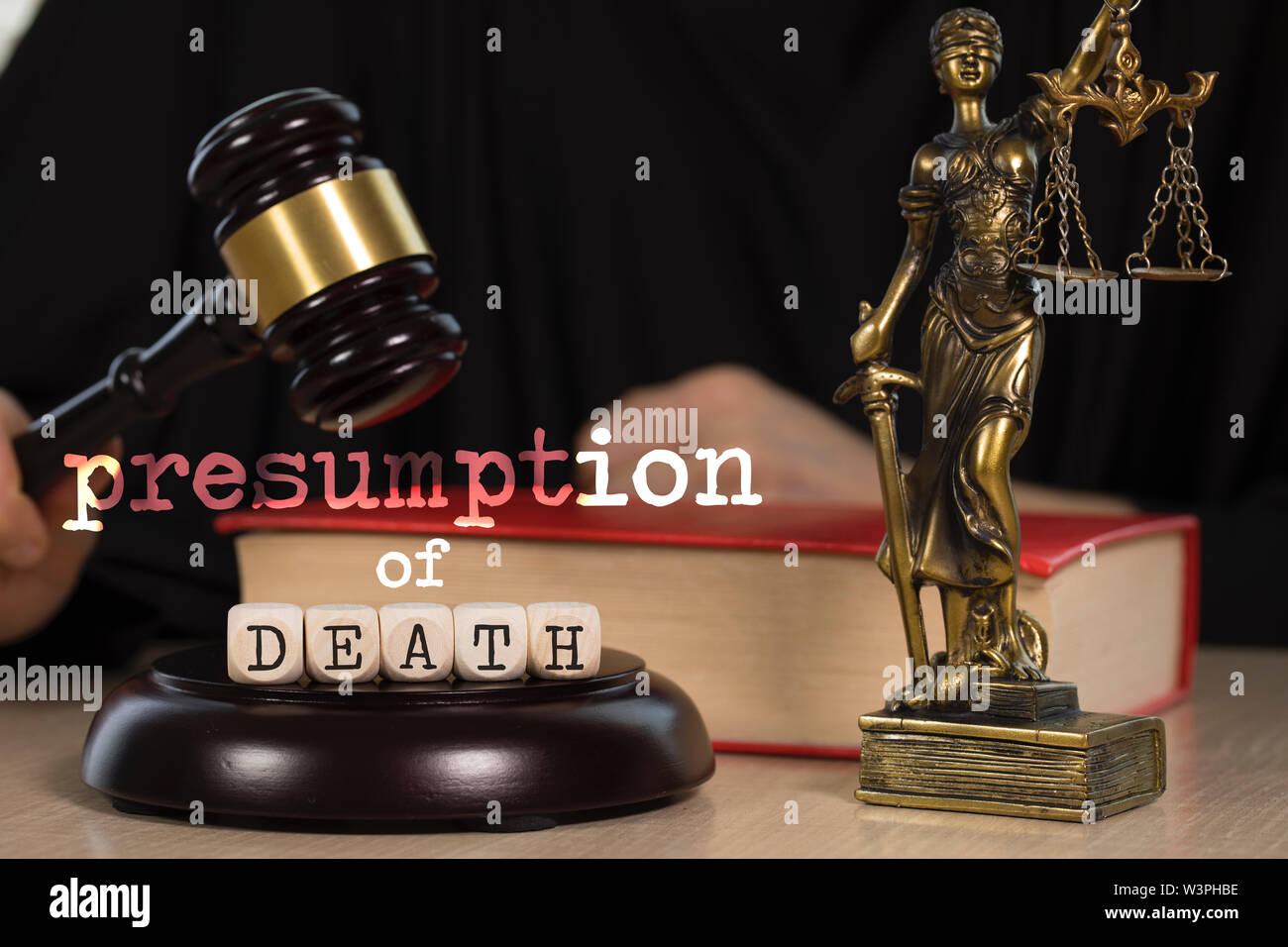Words PRESUMPTION of DEATH composed of wooden dices. Wooden gavel and ...