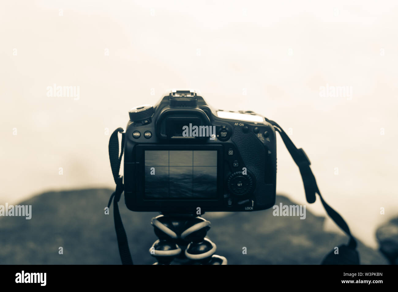 camera on a gorilla pod taking pictures of a landscape Stock Photo - Alamy